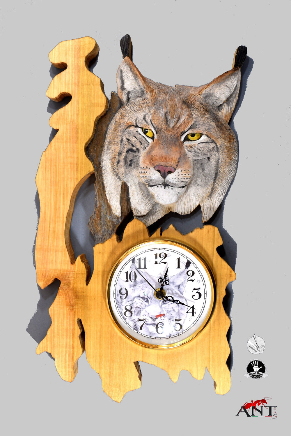 Carved lynx head, engraved wall clock | AntSarT